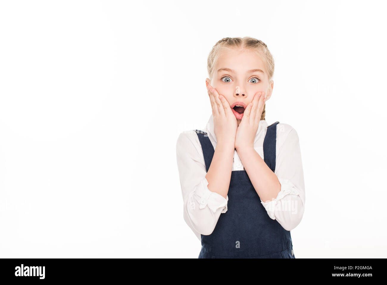 shocked little girl looking at camera isolated on white Stock Photo - Alamy