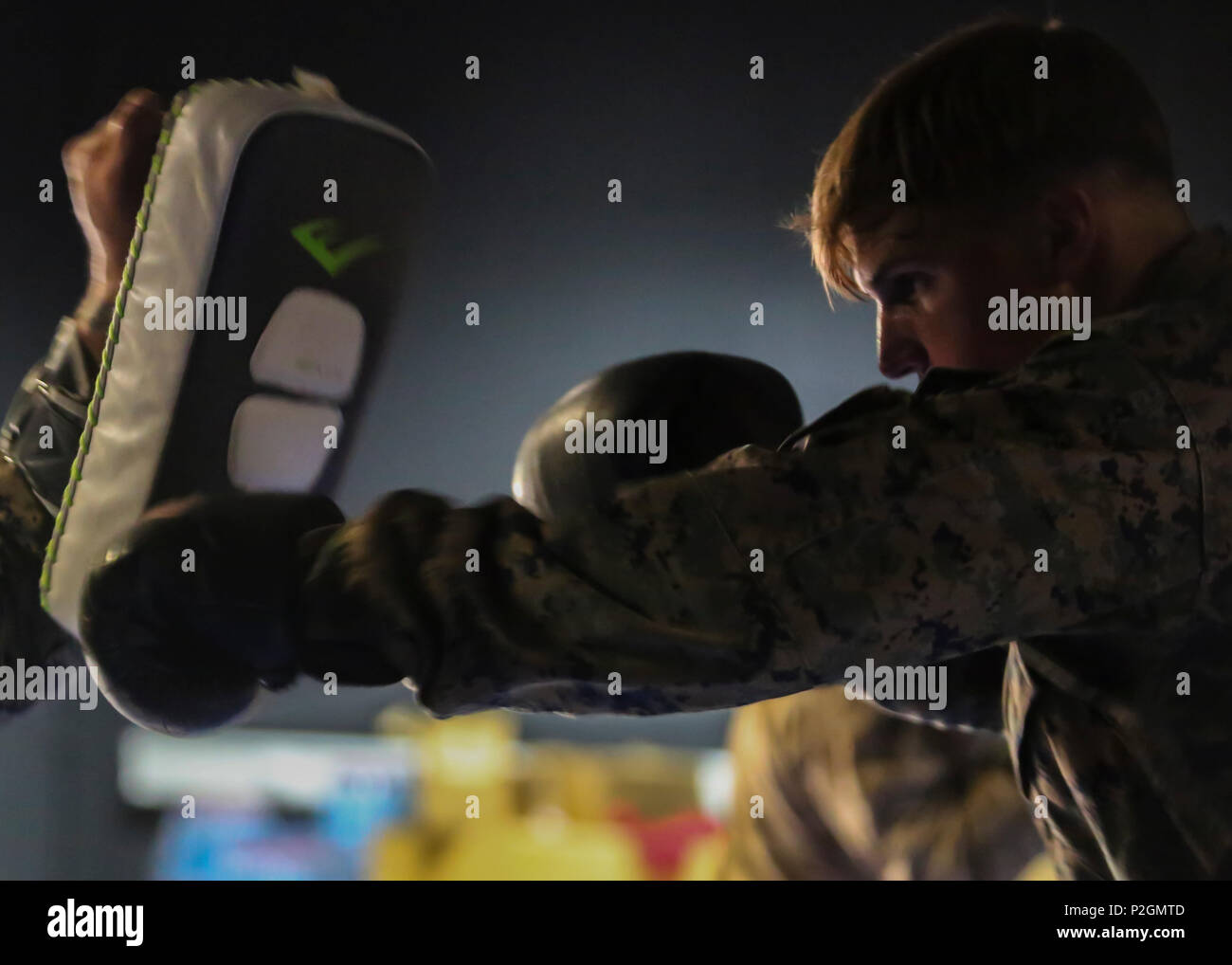 U.S. Marines and Romanian soldiers spar during a martial arts ...
