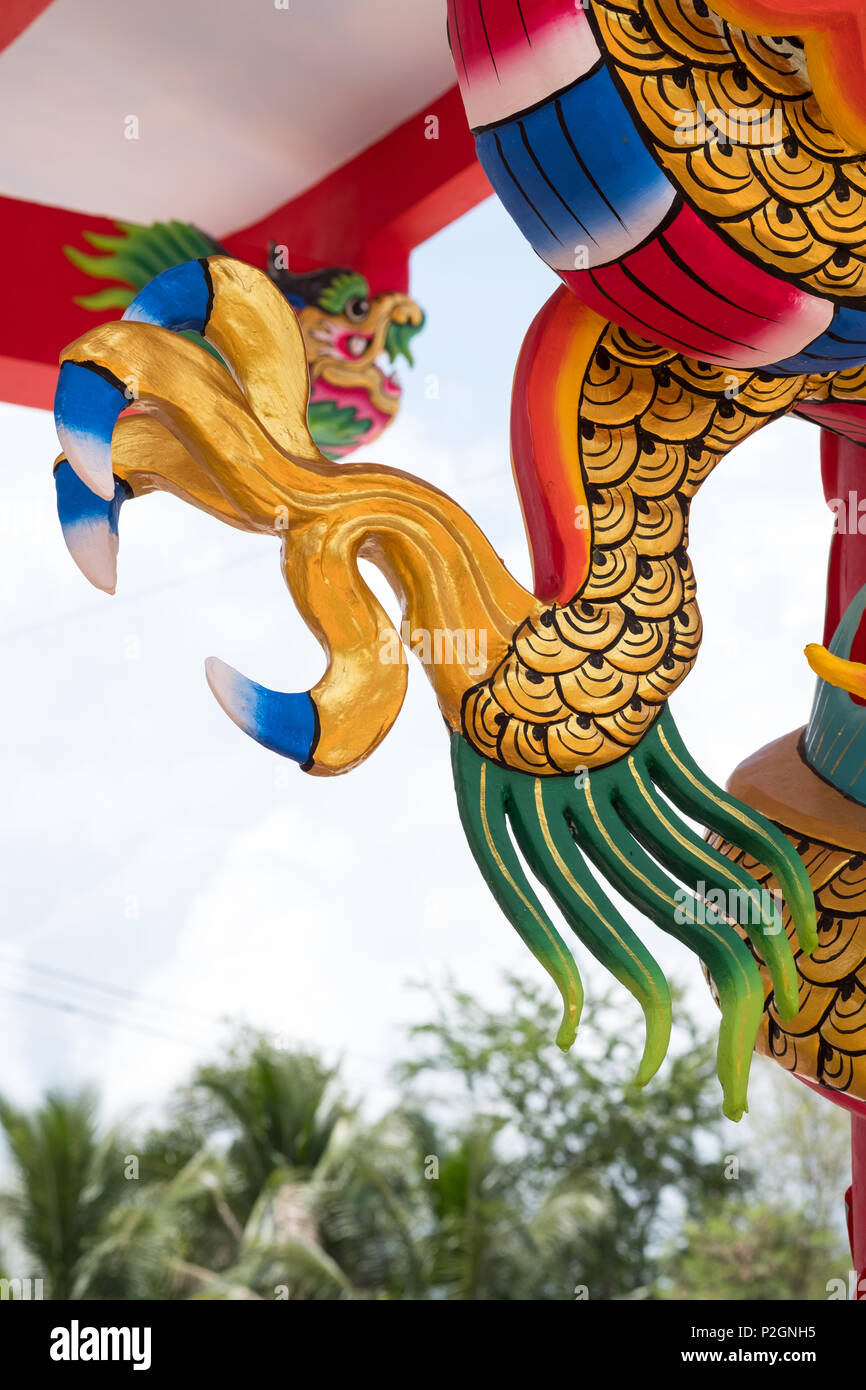 Dragon or monster paw. Golden dragon claw dragon foot statue Stock ...