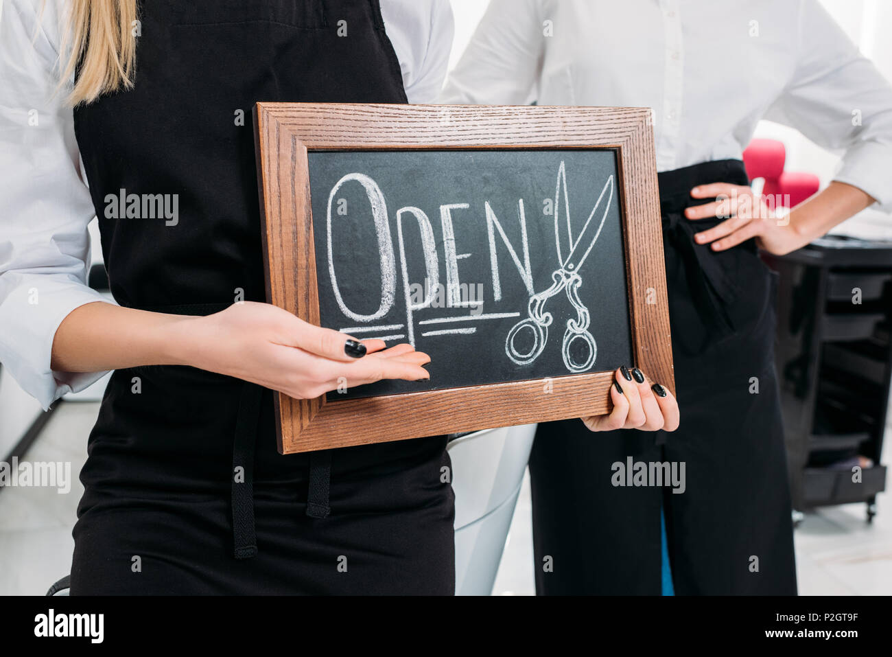 Hairdresser's hands with scissors hi-res stock photography and images ...