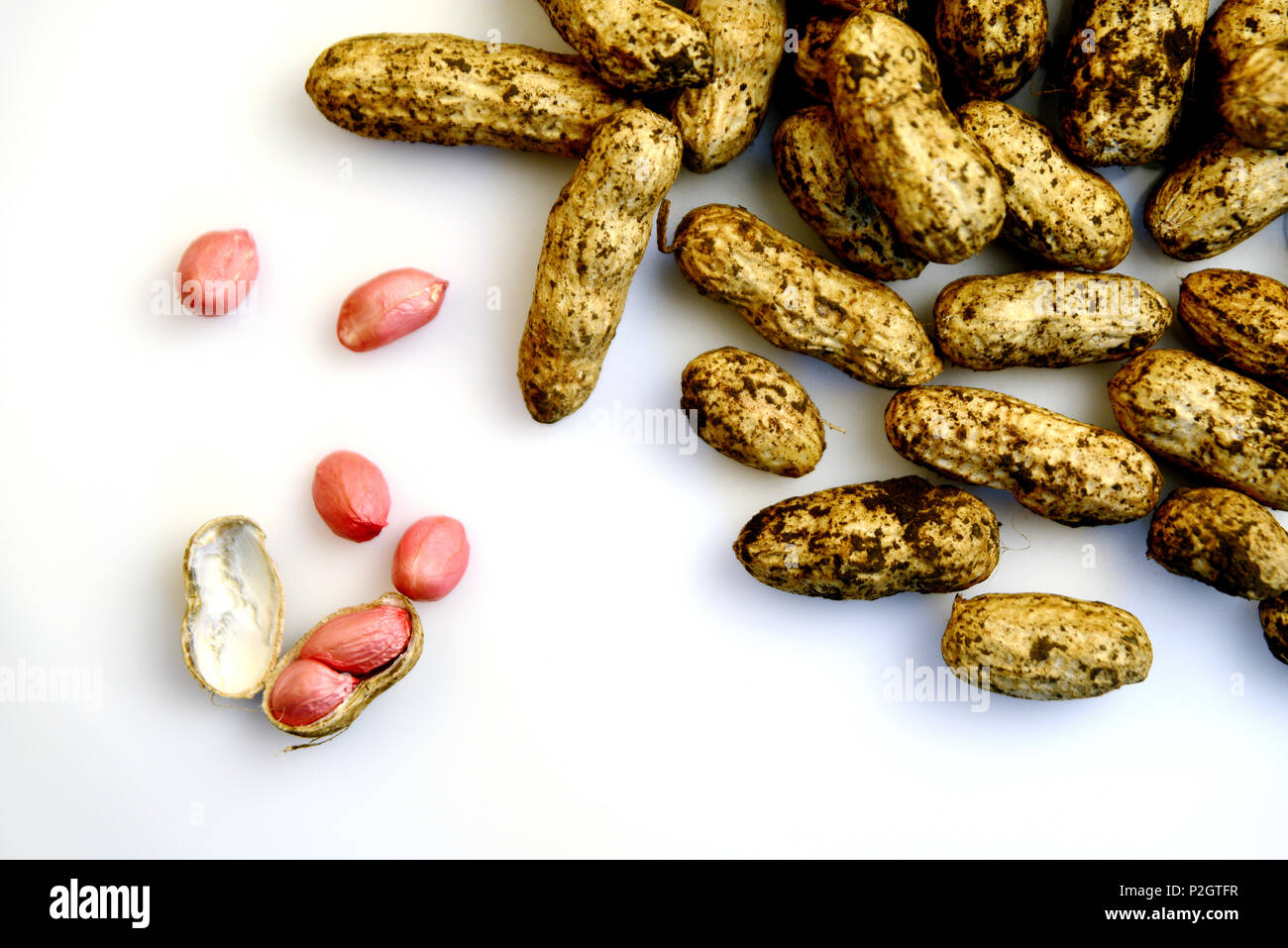 Raw Peanuts on white background Stock Photo - Alamy