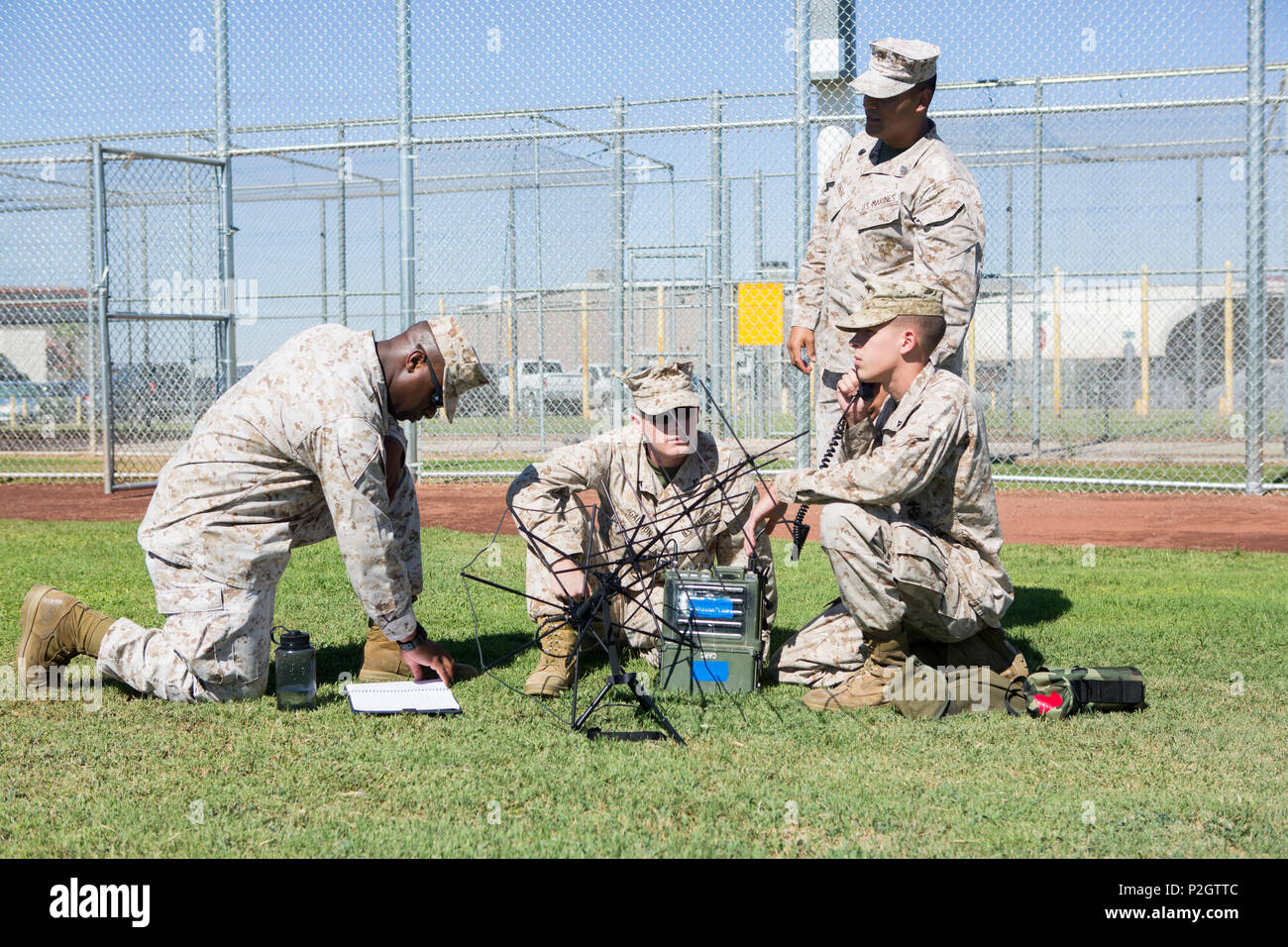 U.S. Marine Corps Lance Cpl. Dylan Snodgrass, right, a navigational ...