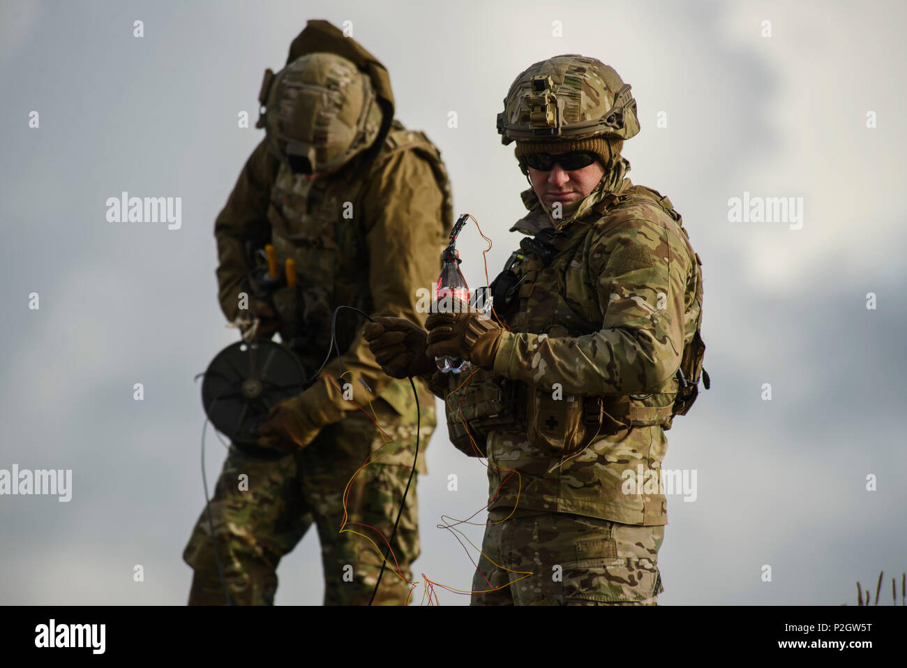 U.S. Air Force Staff Sgt. Cole Carroll, front, and Senior Airman ...