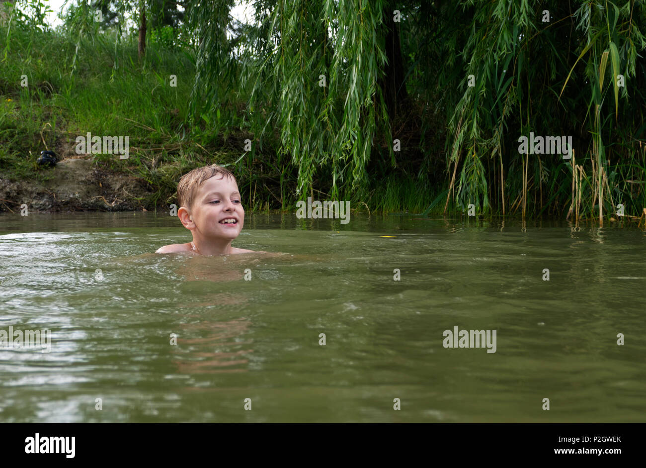 Boy swimming pond hi-res stock photography and images - Alamy