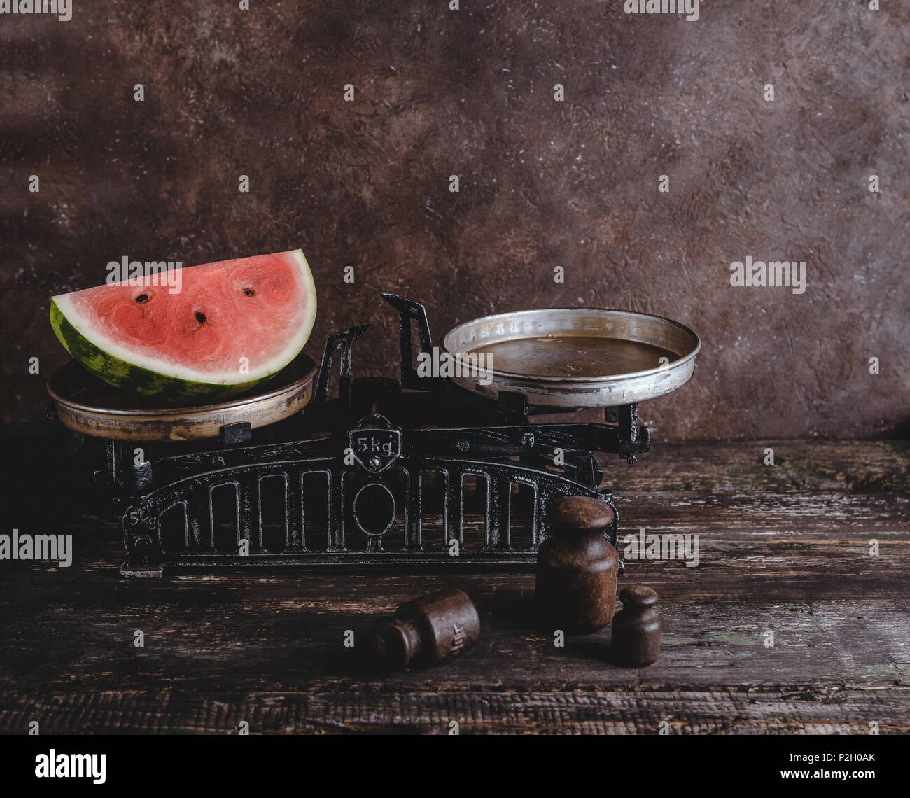 Watermelon on scales hi-res stock photography and images - Alamy