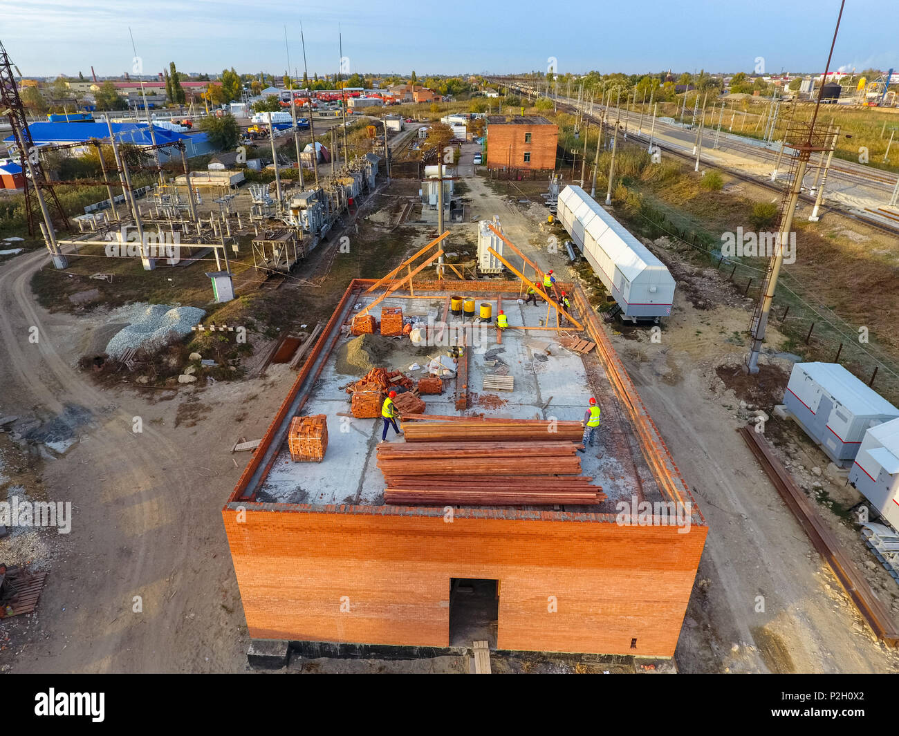 Construction of a brick building. Installation of the roof ...