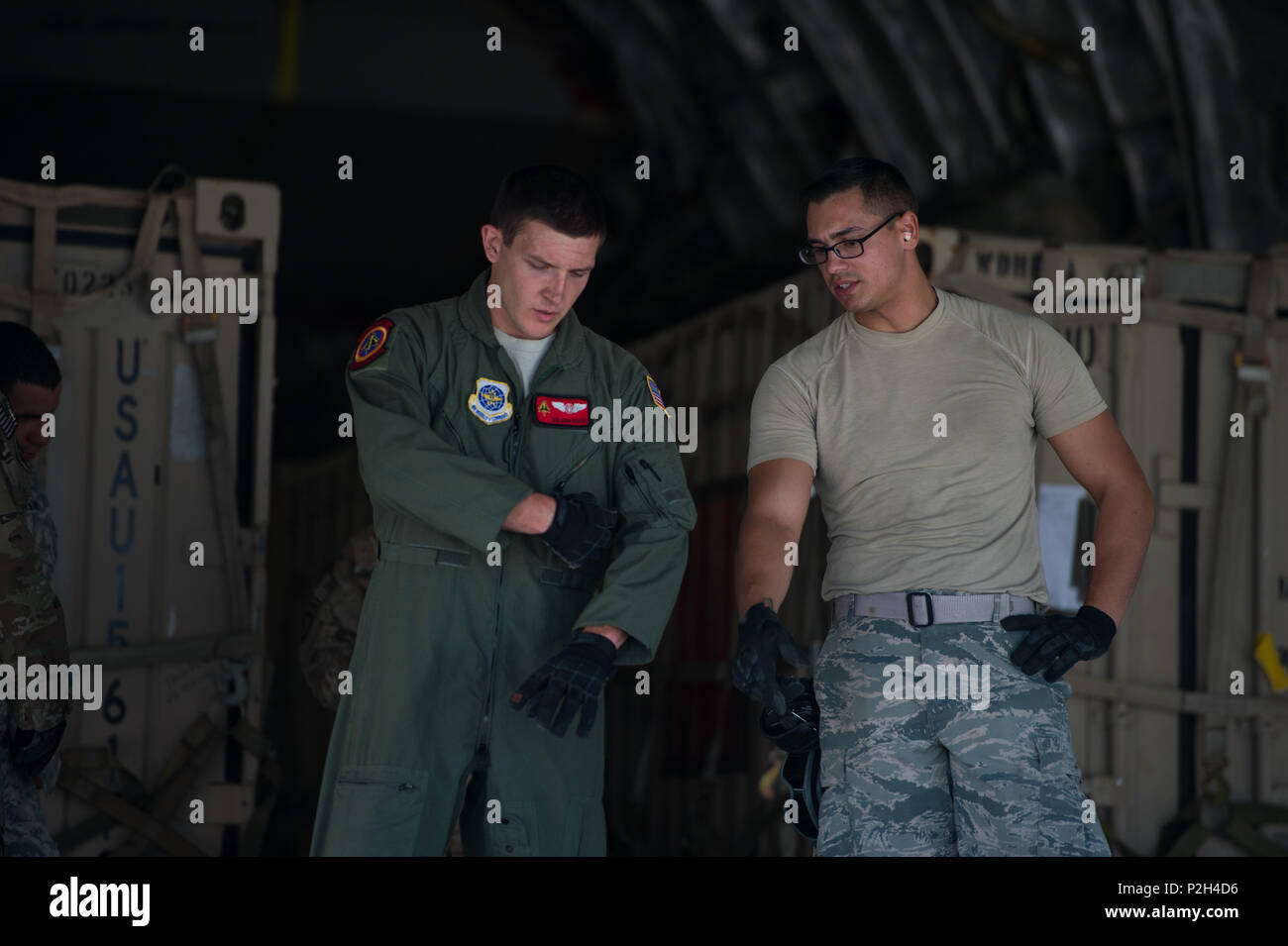 U.S. Air Force Staff Sgt. Raymond Simmons, right, 921st Contingency ...