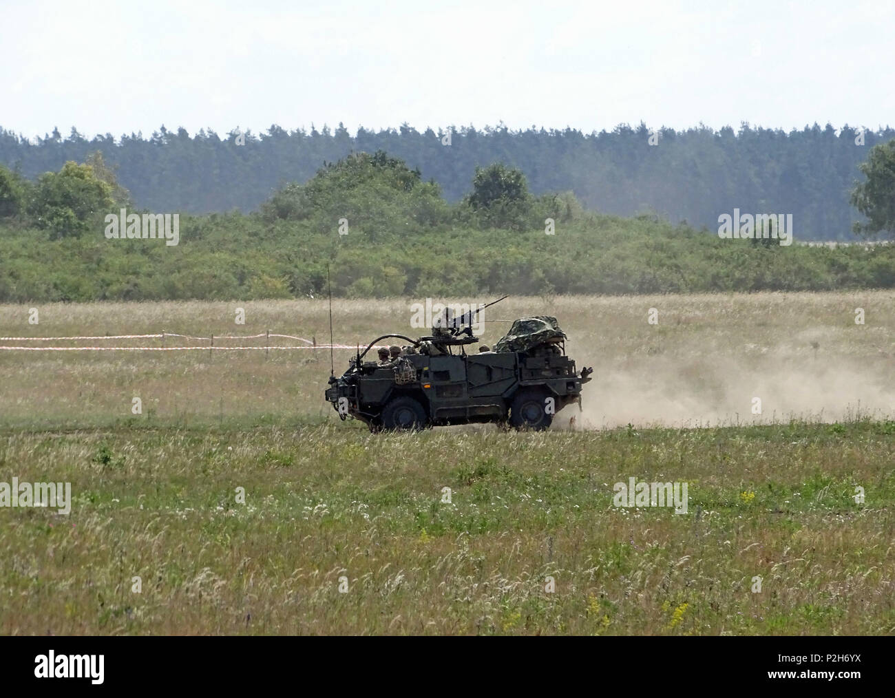 British soldiers from 1st The Queen's Dragoon Guards on a Jackal light ...
