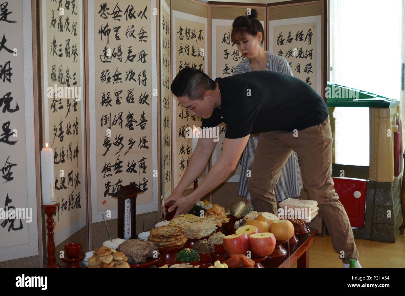 During the ceremonial meal offering of the Family’s Chuseok celebration ...