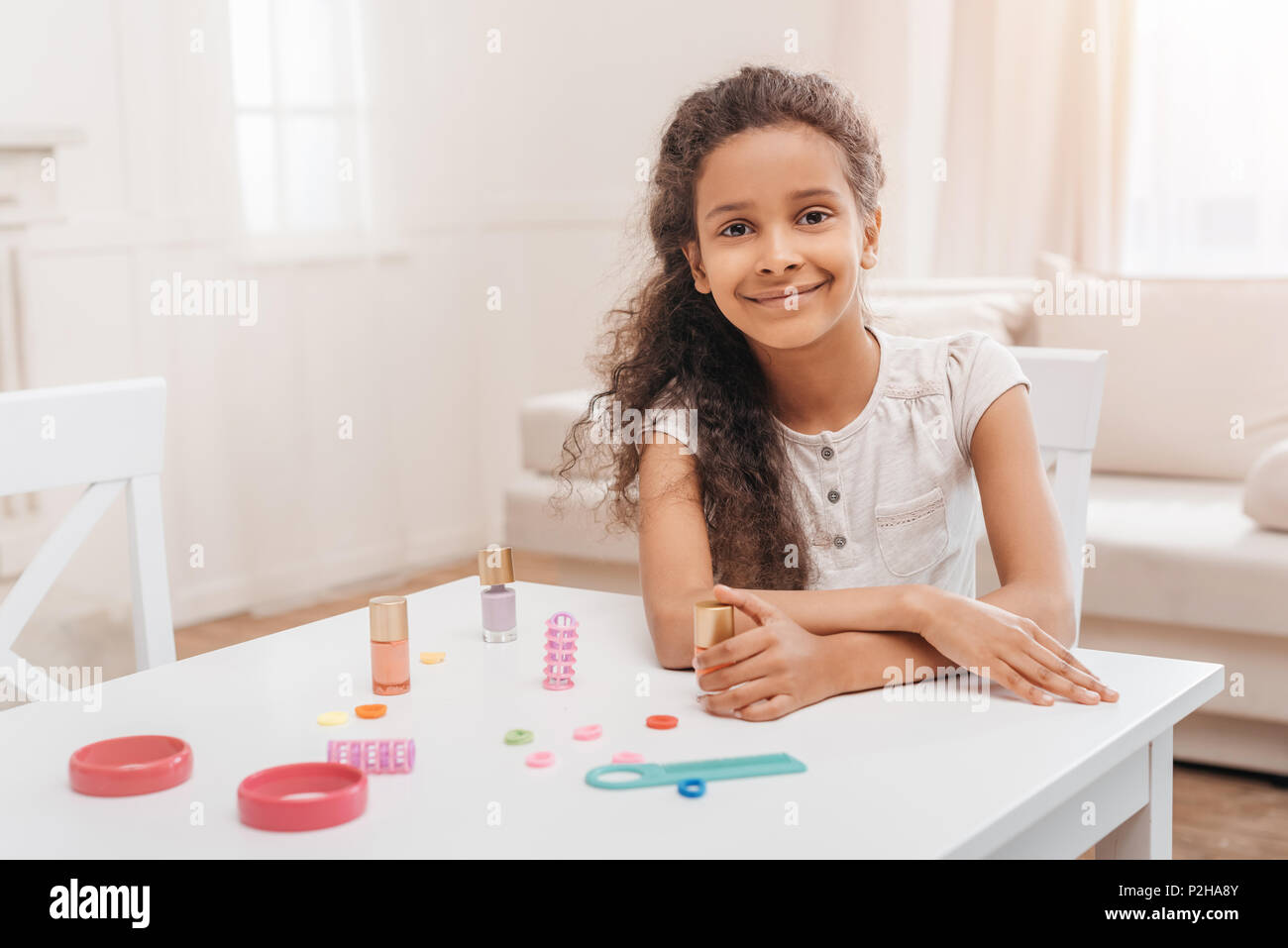 Girl doing nails hi-res stock photography and images - Alamy