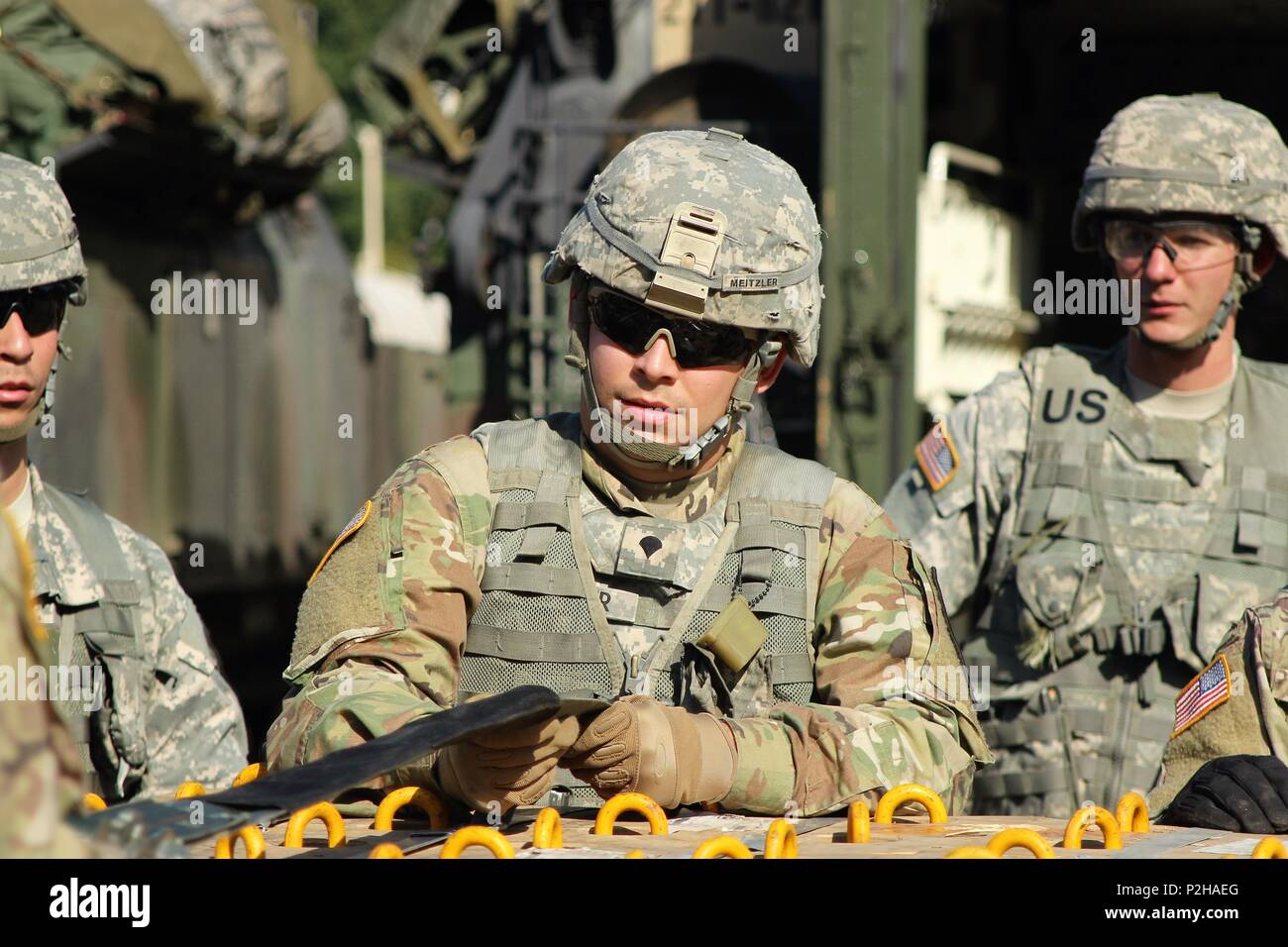 Spc. Joseph Meitzler, a palletized loading system ammunition specialist ...