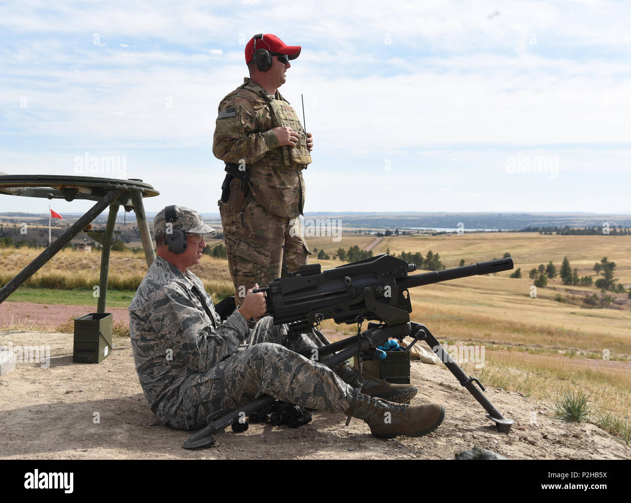 Col. Colin Connor, 91st Missile Wing commander, fires an MK-19 ...