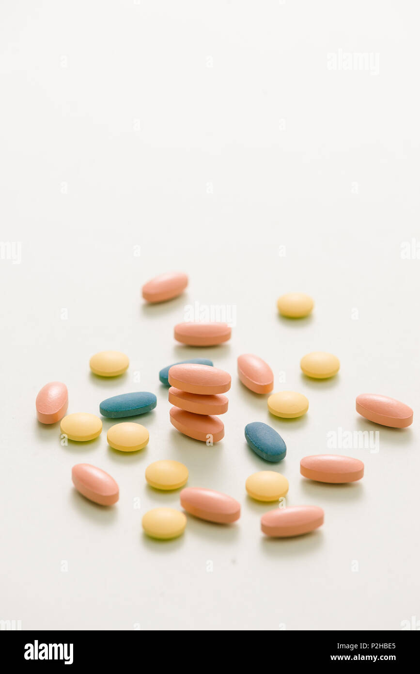 Colorful tablets with capsules Stock Photo - Alamy