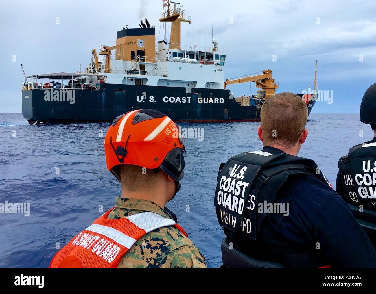 A joint boarding team from the U.S. Coast Guard buoy tender USCGC ...