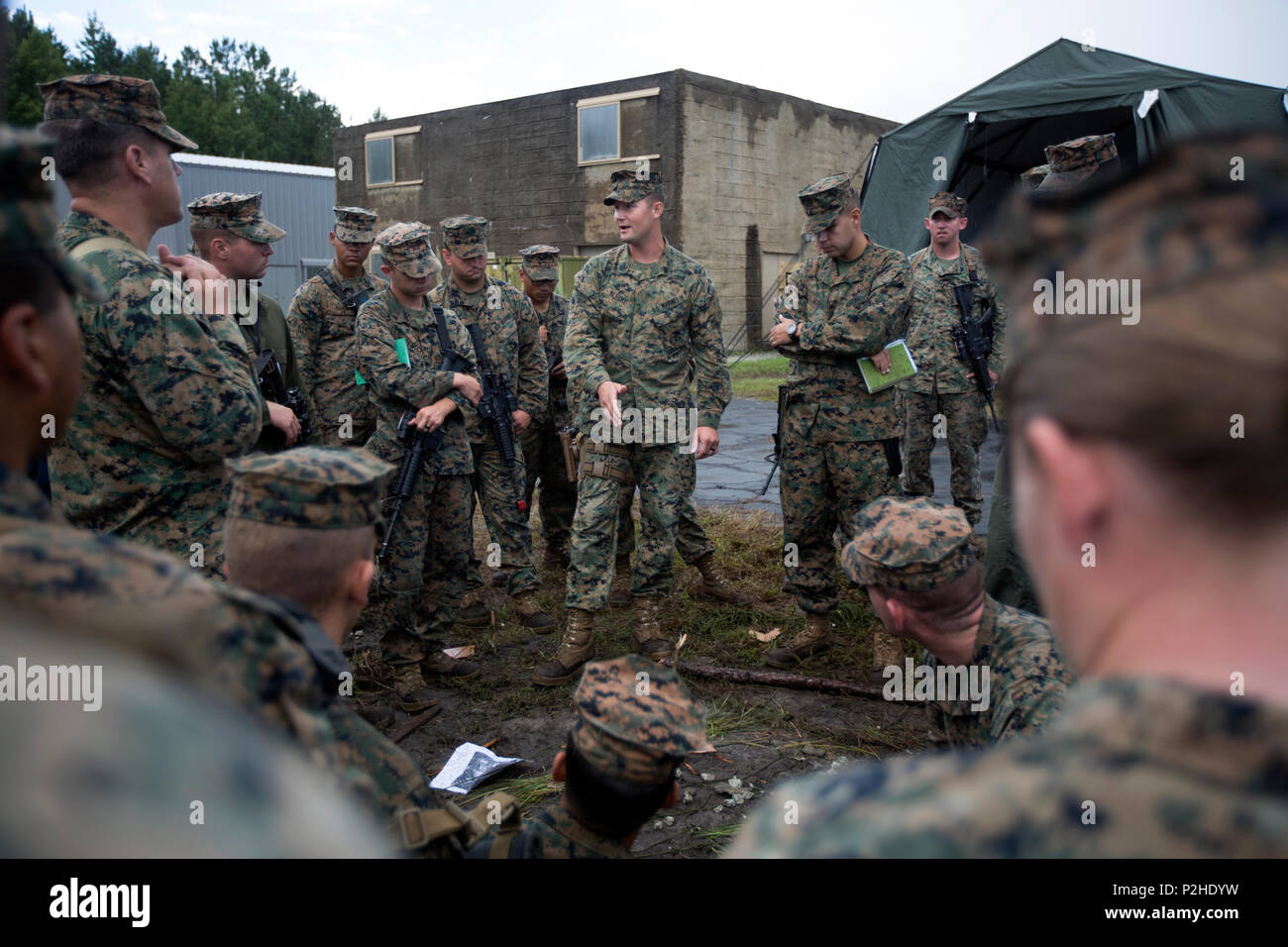 Staff Sgt. Julius Bleske briefs a group of Marines on their mission ...