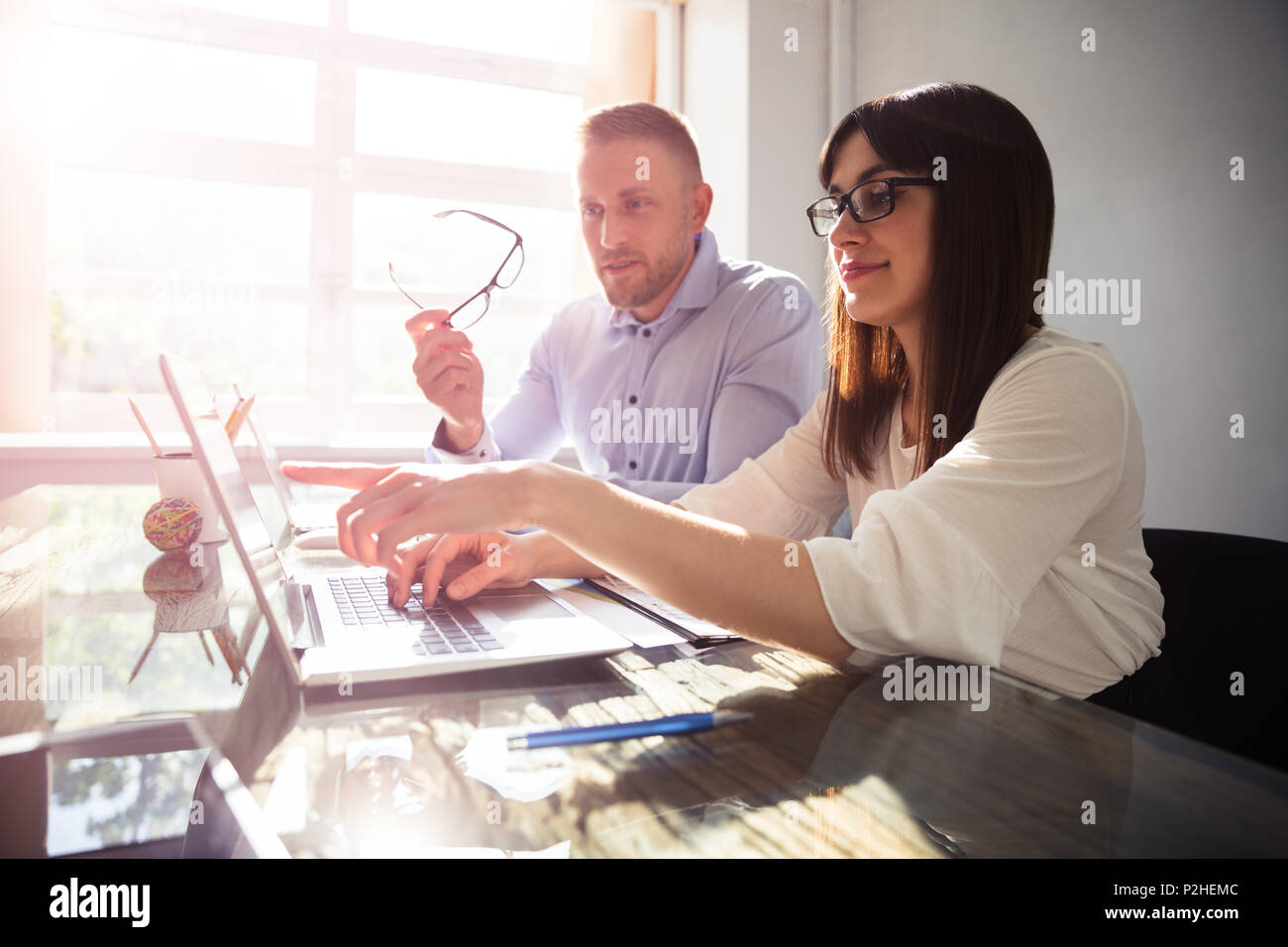 Angry man complaining to collegue at workplace in office Stock Photo ...