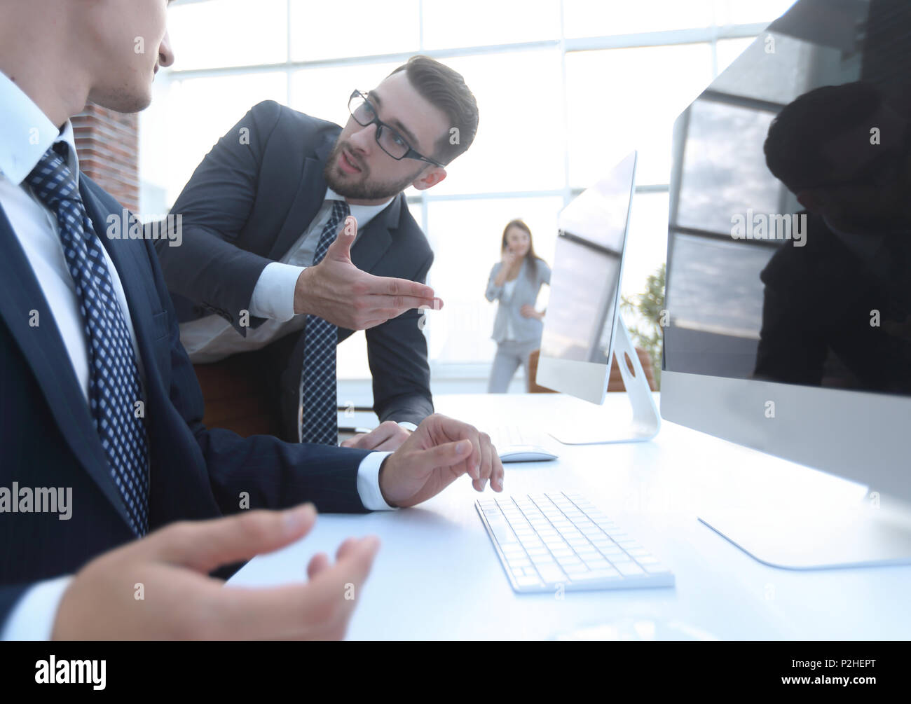 Colleagues In Discussion Stock Photo - Alamy