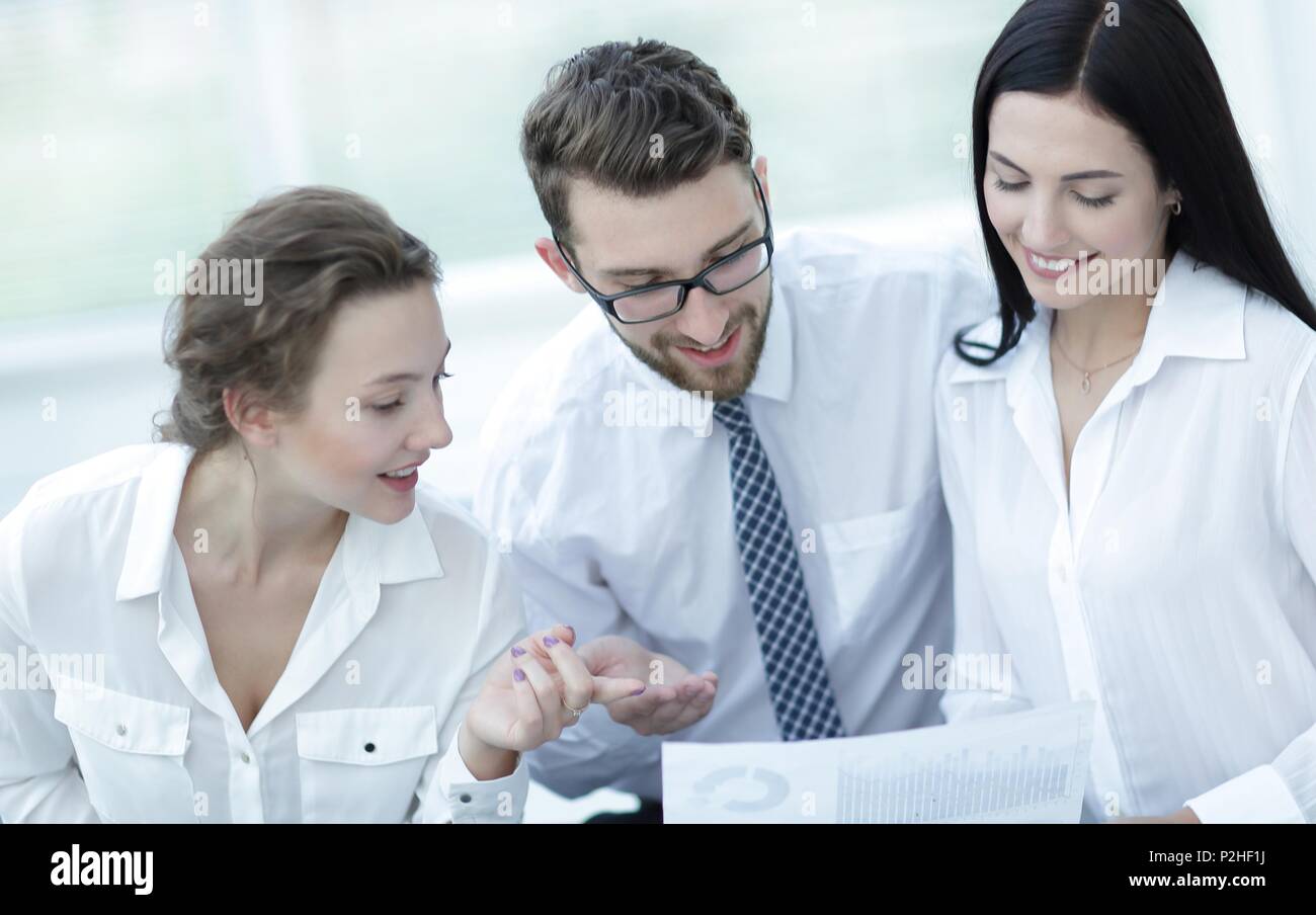 business team working with financial charts in the office Stock Photo ...