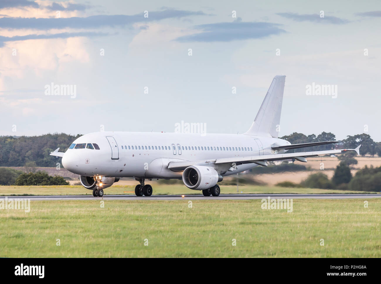 An Airbus A320 commercial airliner with blank livery taking off Stock ...