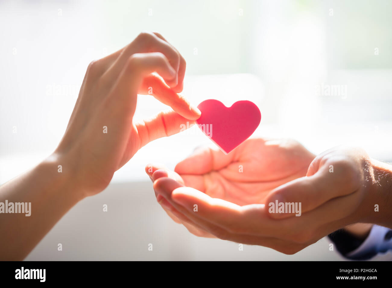 Couple heart hands close up hi-res stock photography and images - Alamy