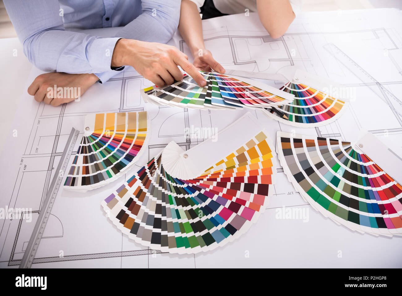 Close-up Of Two Architect's Hand Choosing Color From Various Colorful ...