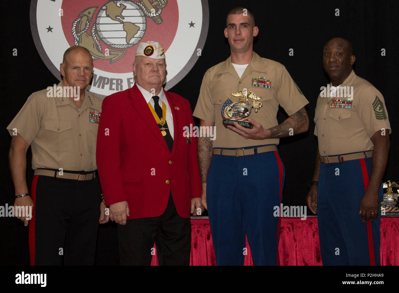 From left, Commandant of the Marine Corps Gen. Robert B. Neller ...