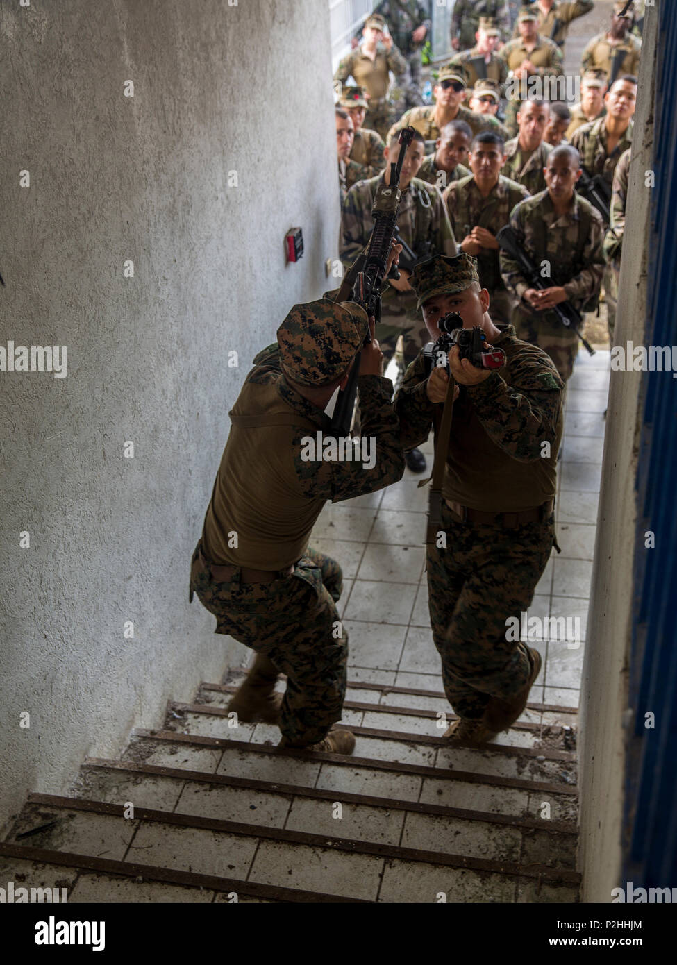 TARAVAO, Tahiti – U.S. Marine Lance Cpl. Cory Walters, left, a combat ...