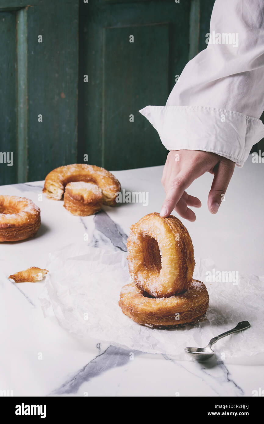 Puff pastry donuts cronuts Stock Photo - Alamy