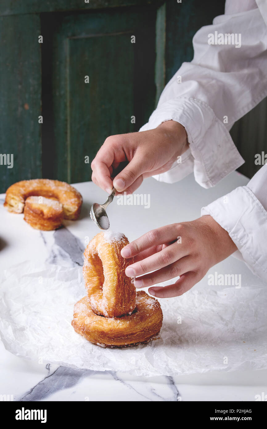 Puff pastry donuts cronuts Stock Photo - Alamy