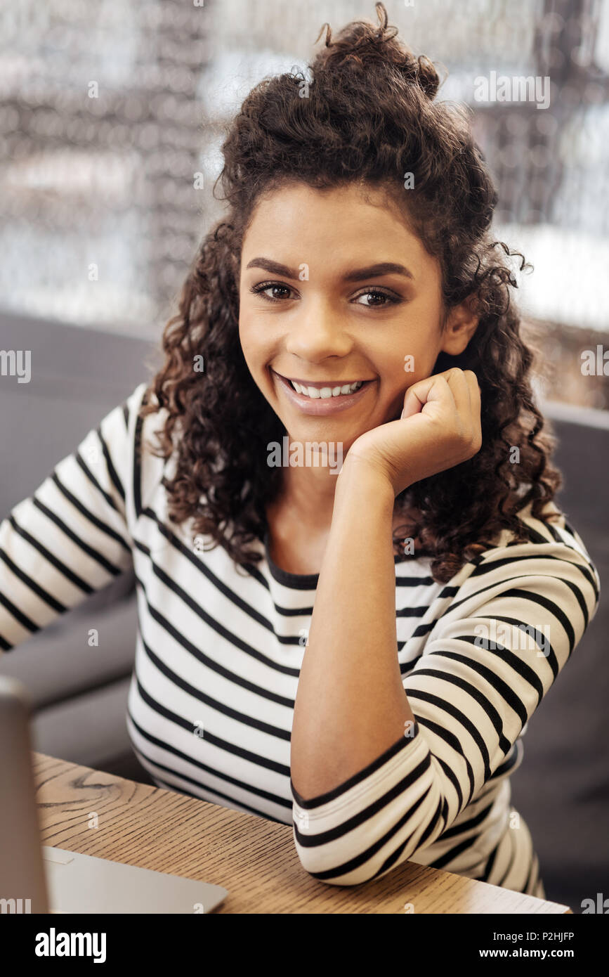 Delighted female sitting table laptop hi-res stock photography and ...