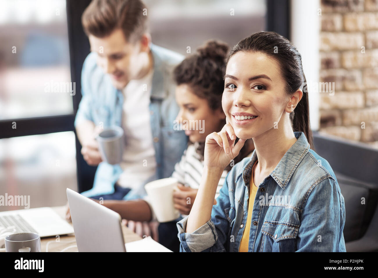 Delighted multiethnic women smiling hi-res stock photography and images ...