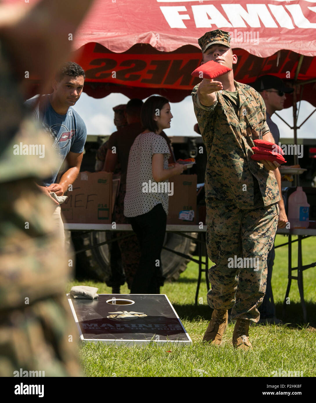 Sgt. Harris Johnson throws beanbag during the Camp Hansen Highland ...