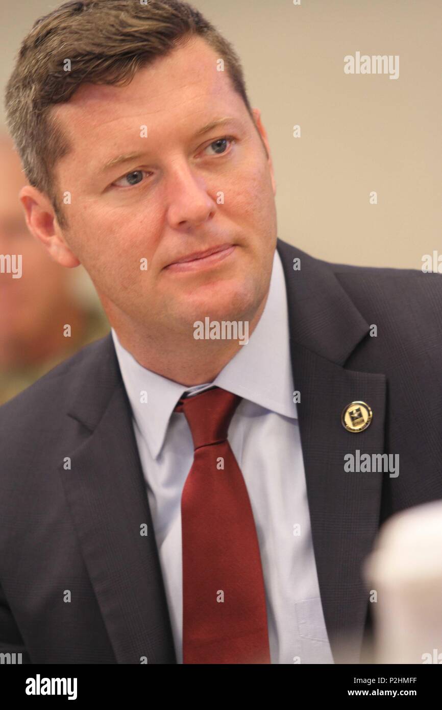 The Honorable Patrick Murphy, under secretary of the Army, listens to ...