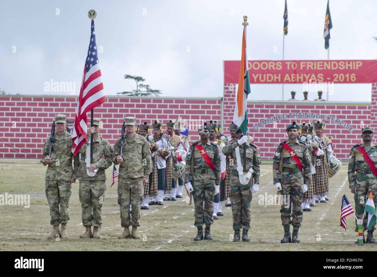 U.S. soldiers (left) with 5-20th Infantry Regiment, 1-2 Stryker Brigade ...