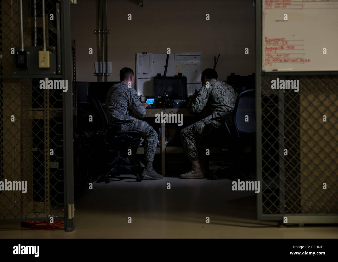 Staff Sgt. Austin Gootee and Petty Officer 2nd Class Steven Jones test ...