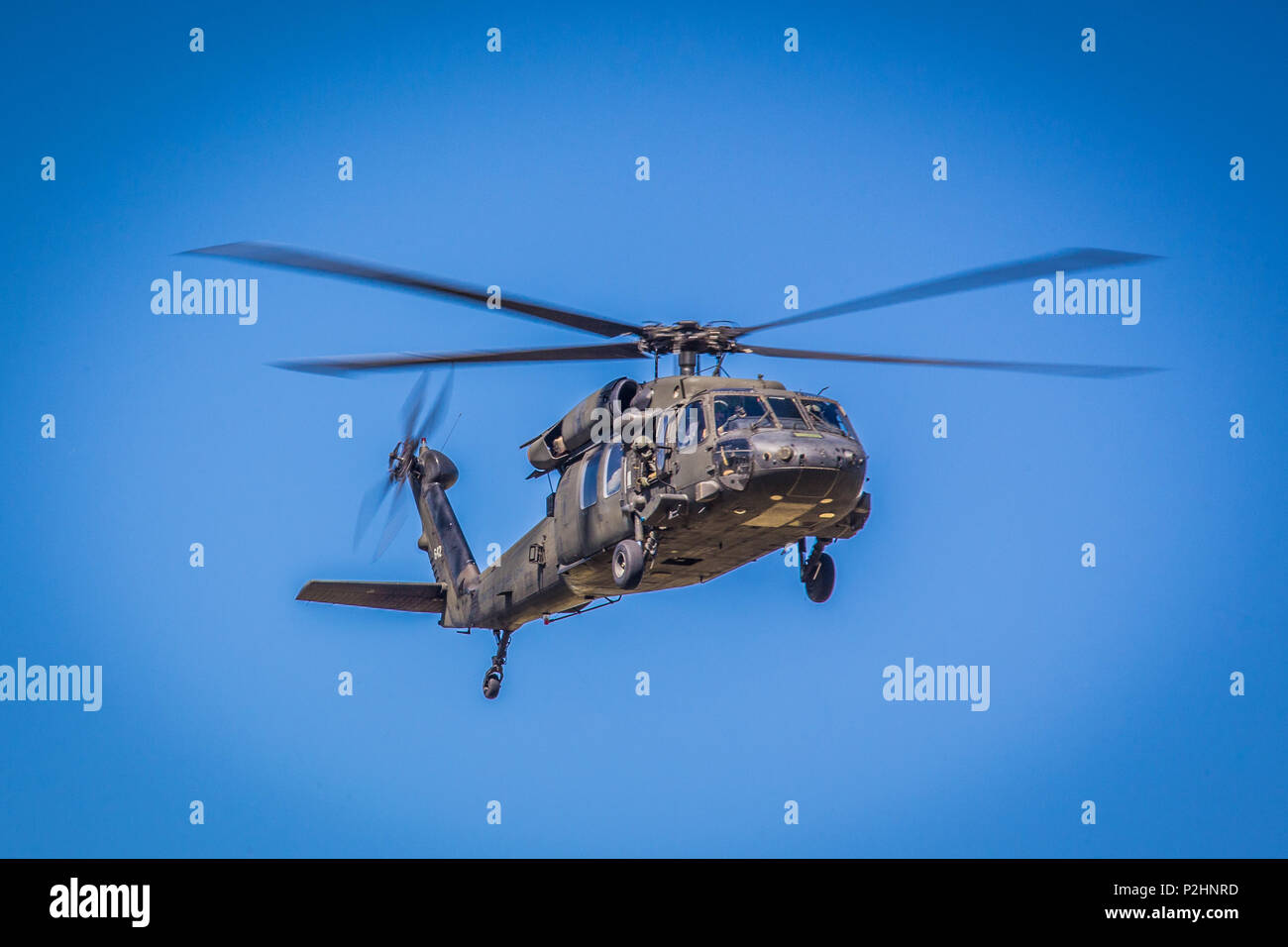 A U.S. Army UH-60 Black Hawk helicopter takes off after picking up ...