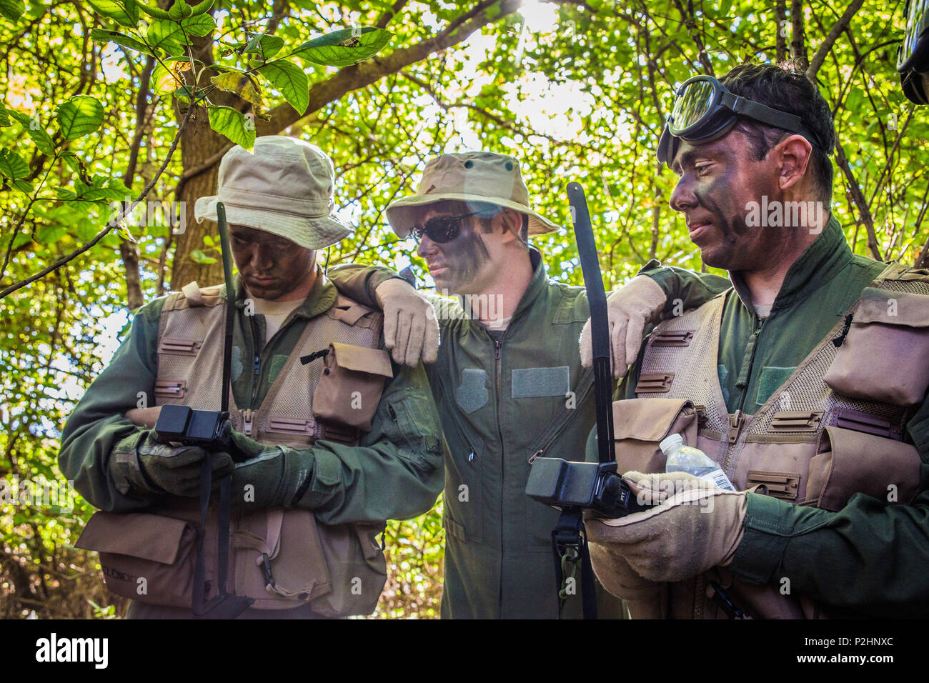 U.S. Air Force Senior Airman Cody Harter, Staff Sgt. Jacob King and ...