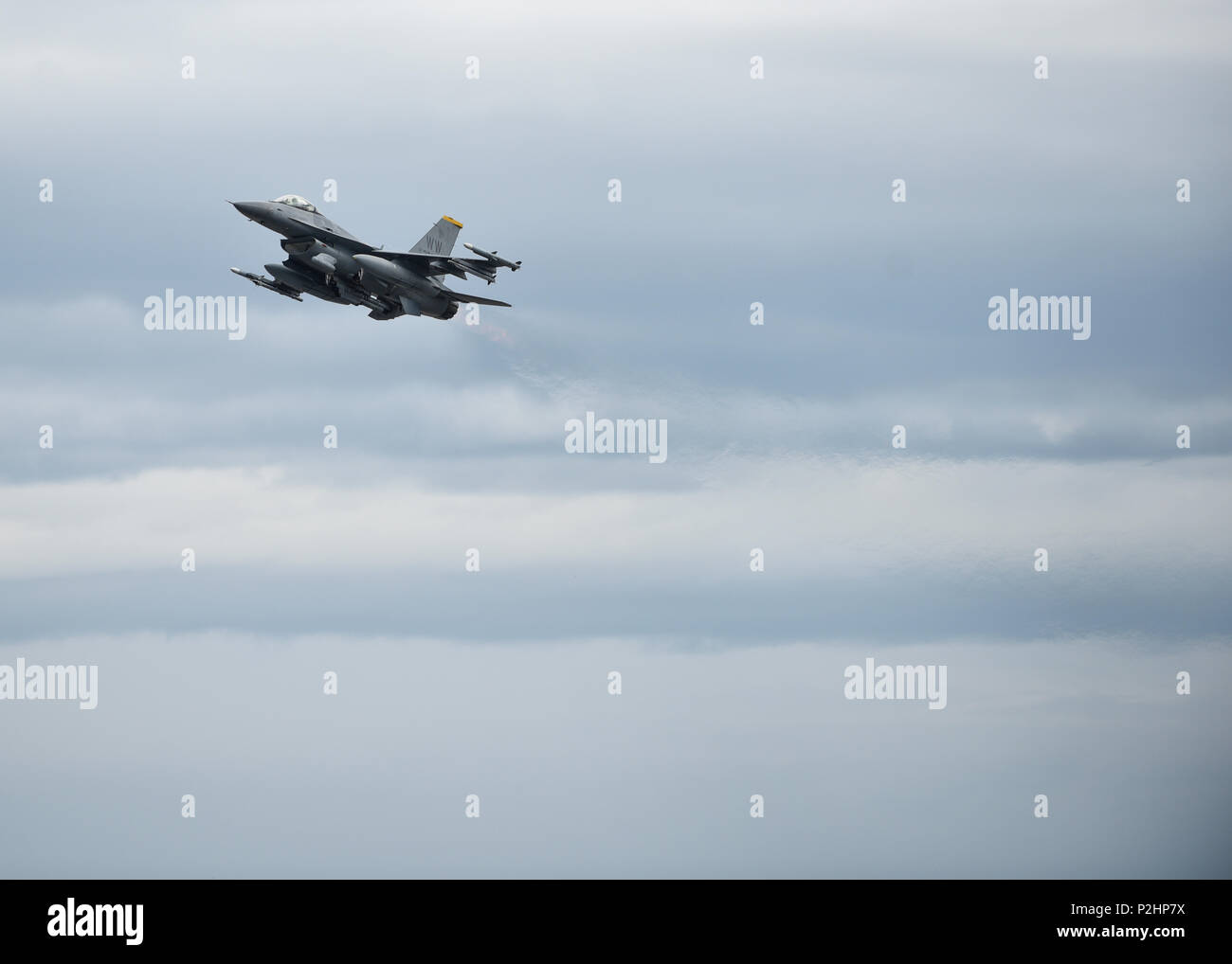 A 14th Fighter Squadron F-16 Fighting Falcon soars into the sky at ...