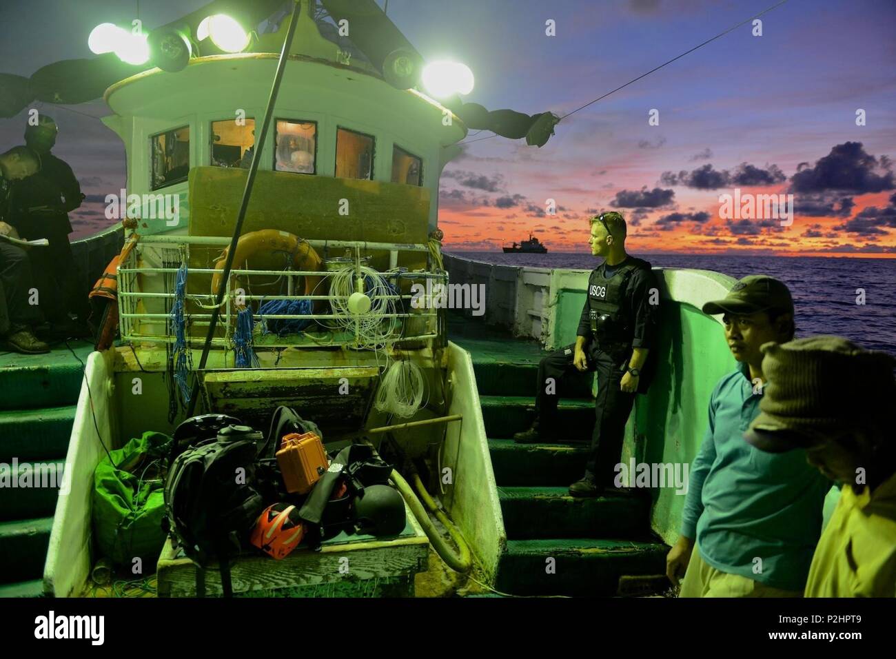 U.S. Coast Guard Petty Officer 1st Class Brett Malone, a damage ...