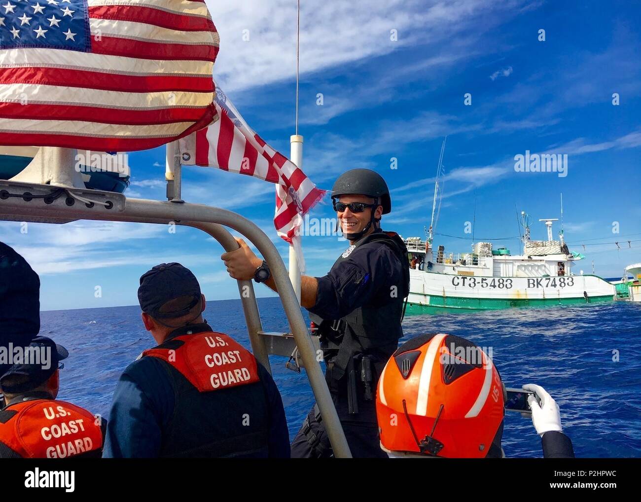 U.S. Coast Guard Petty Officer 1st Class Brett Malone, a damage ...