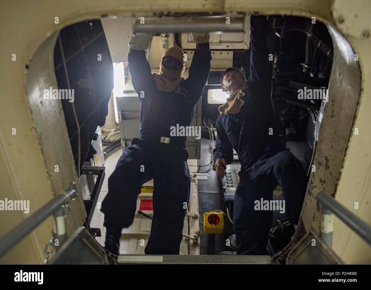 During a general quarters drill aboard USS Stout (DDG 55), sailors ...