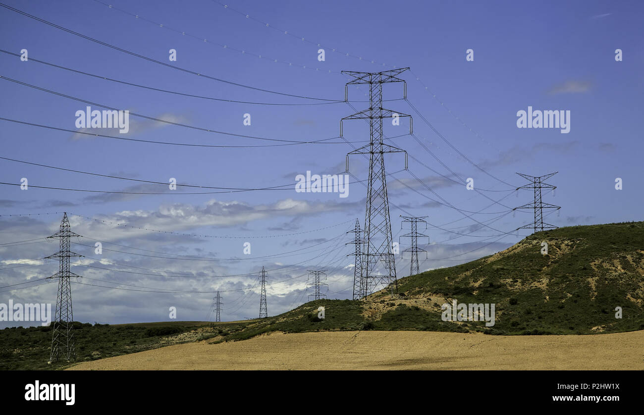 Electric towers in a landscape, detail of electric power transport ...
