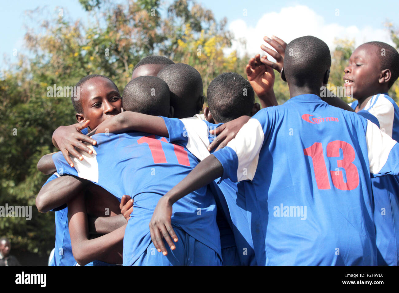 Children jubilating after a sweet victory in a football match in Moroto ...