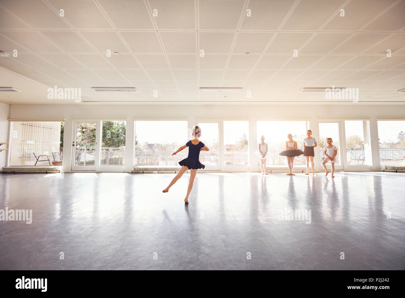 Young children watching a performance hi-res stock photography and ...
