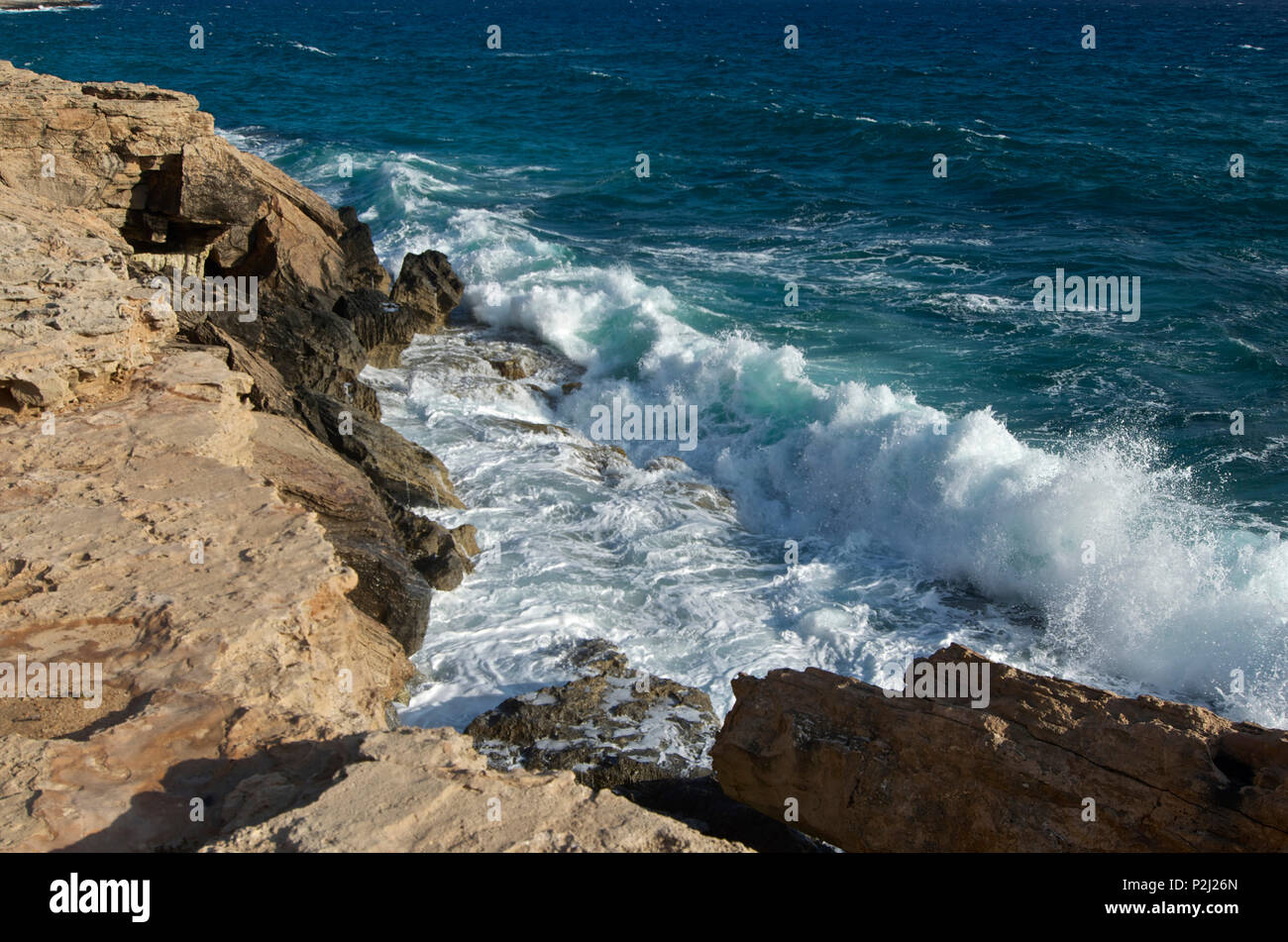 Wild steep coast at Cape Greco near Ayia Napa northeast of Larnaca ...