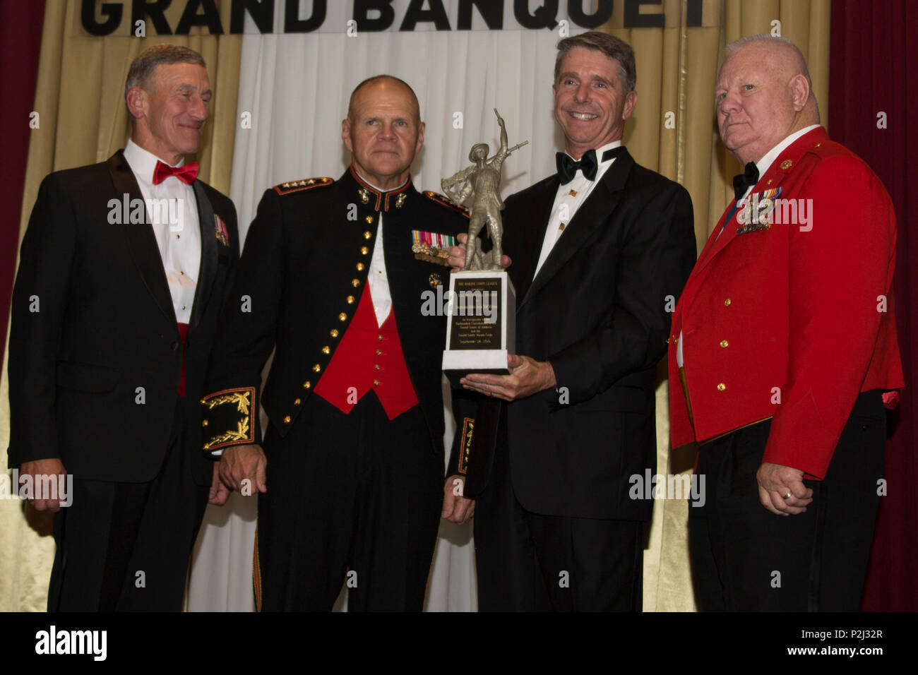 From left, retired U.S. Marine Corps Maj. Gen. Michael R. Regner ...