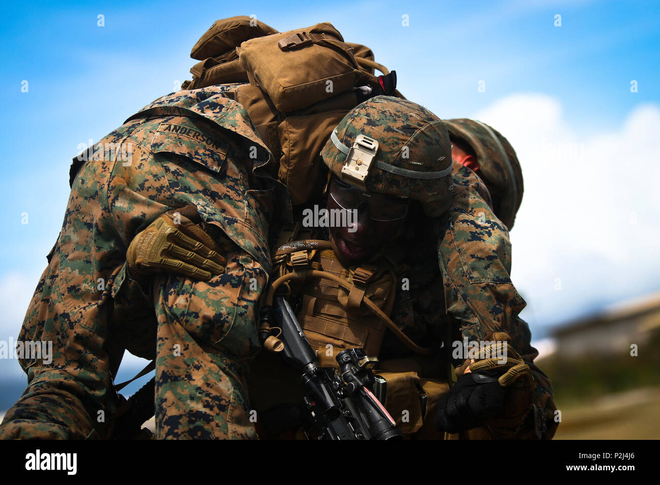U.S. Marine Corps Pfc. Tevin J. Poulson, a rifleman with Alpha Company ...