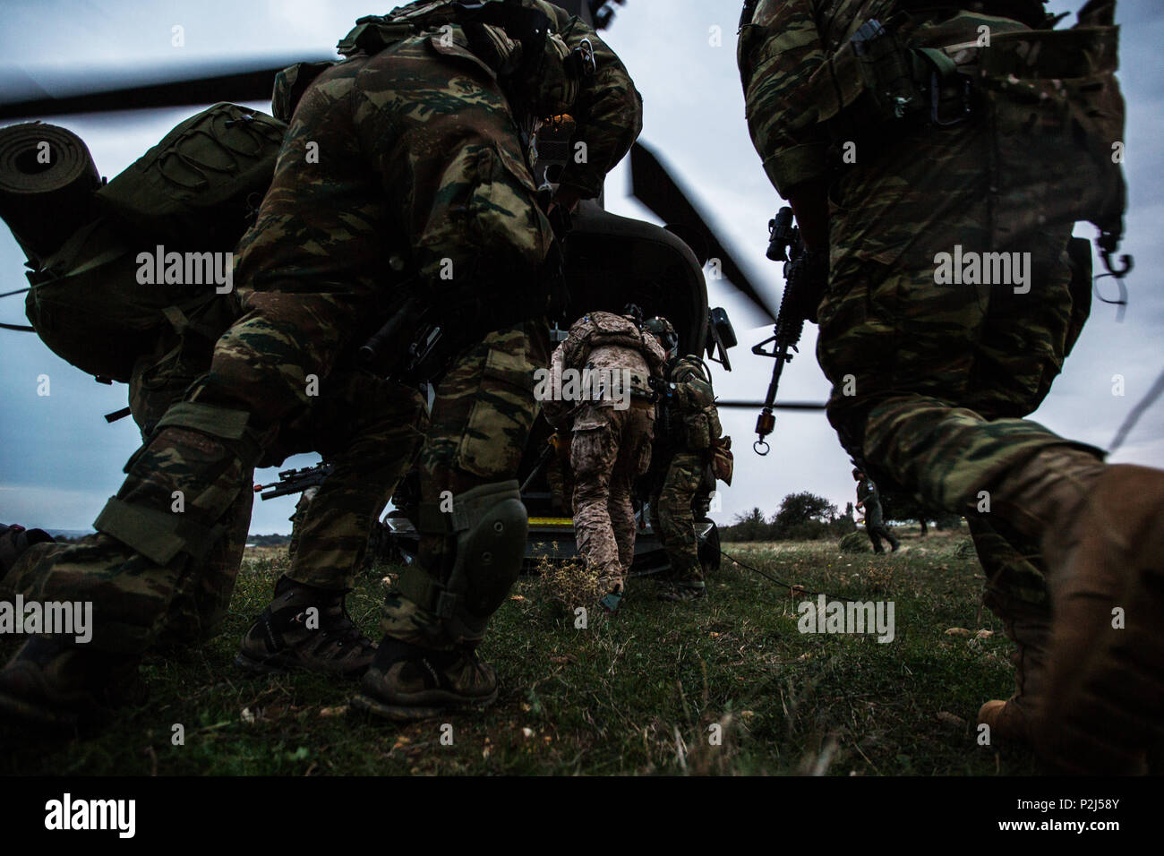 Greek special forces and U.S. Navy Seals enter a CH-47 Chinook after ...