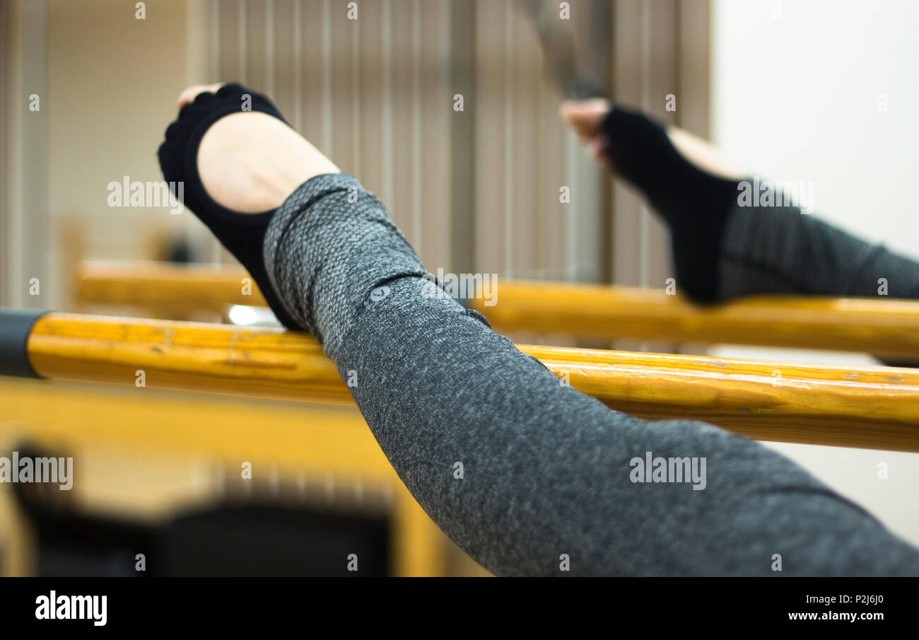 Pilates and ballet fitness stretching and yoga studio gym bar equipment ...