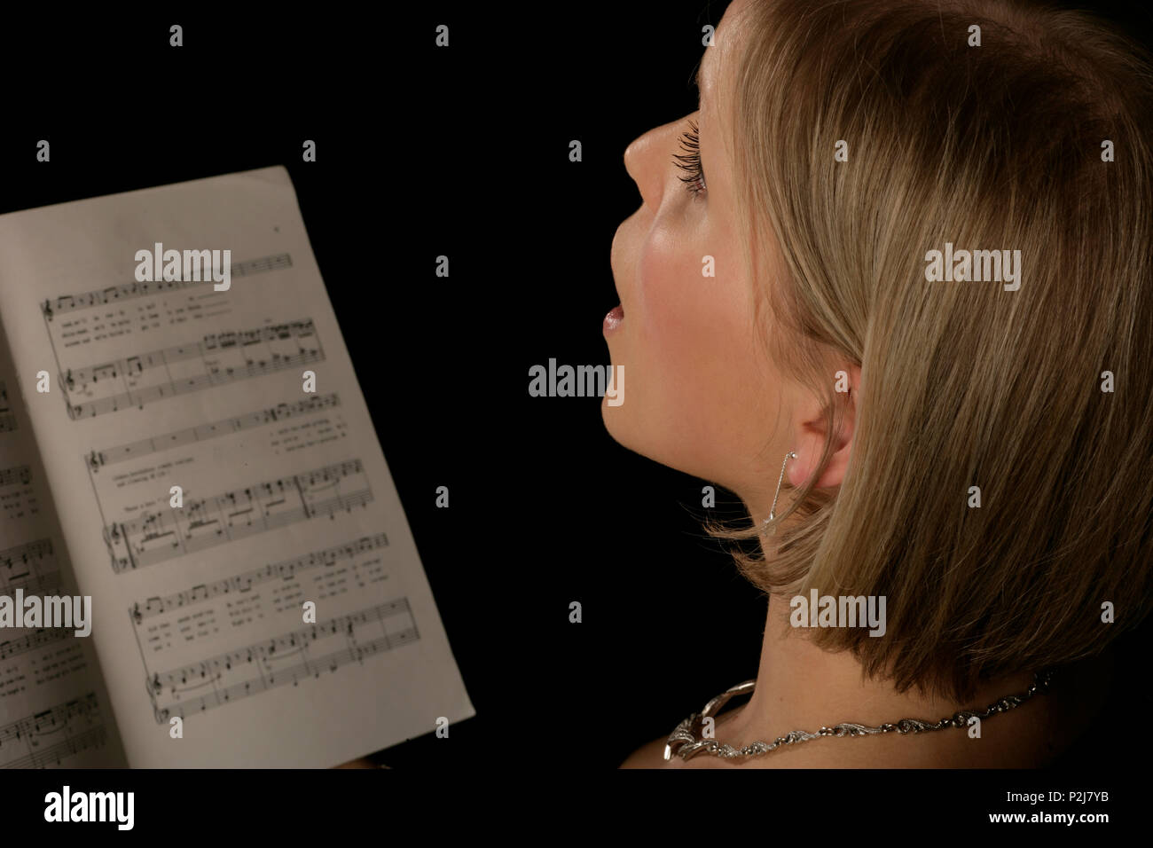 Solo singing hi-res stock photography and images - Alamy